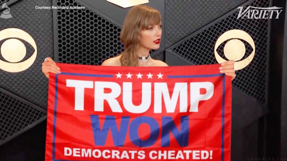 Video Shows Taylor Swift Holding 'Trump Won, Democrats Cheated' Flag at ... Video Shows Taylor Swift Holding 'Trump Won, Democrats Cheated' Flag at ...